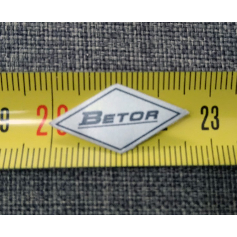 Adhesivo Betor plata.